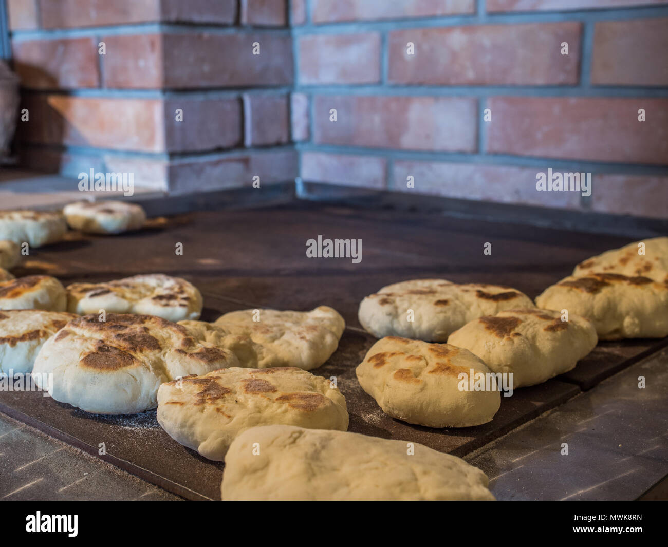 Pancakes on a baking sheet pepared on the coal kitchen. Polish name ...