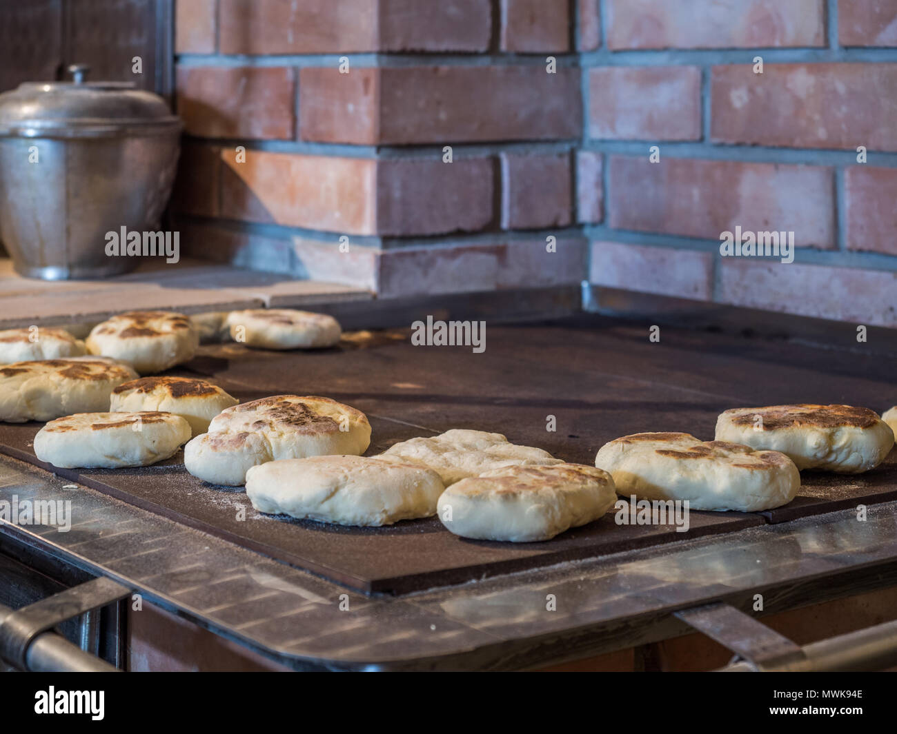 Pancakes on a baking sheet pepared on the coal kitchen. Polish name ...