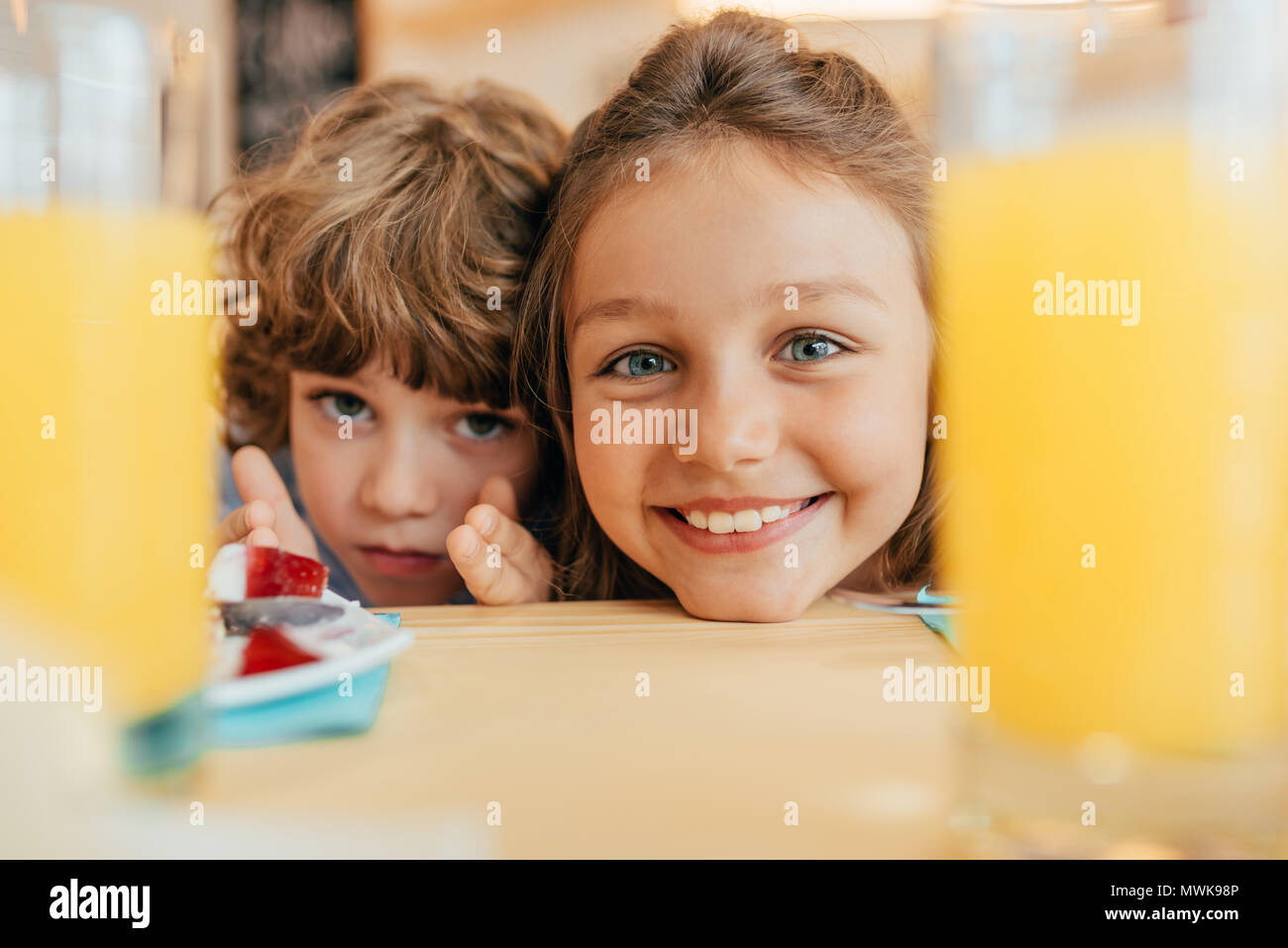 portrait of funny little kids looking at camera Stock Photo - Alamy