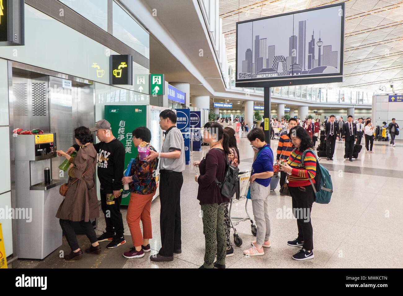 Queue,for,water,both,hot,and,cold,Huge,Beijing Capital International ...