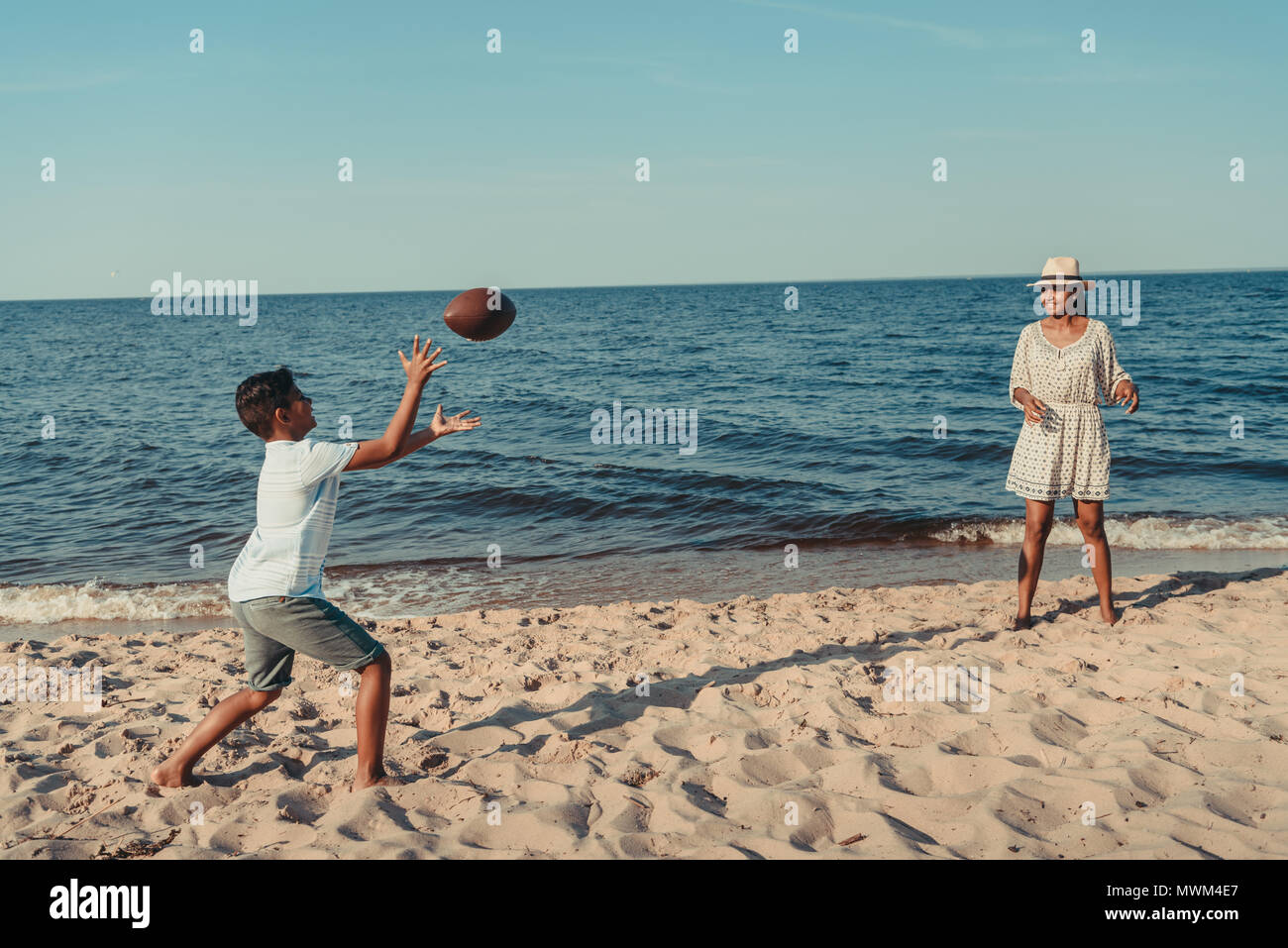 Playing beach rugby hi-res stock photography and images - Alamy