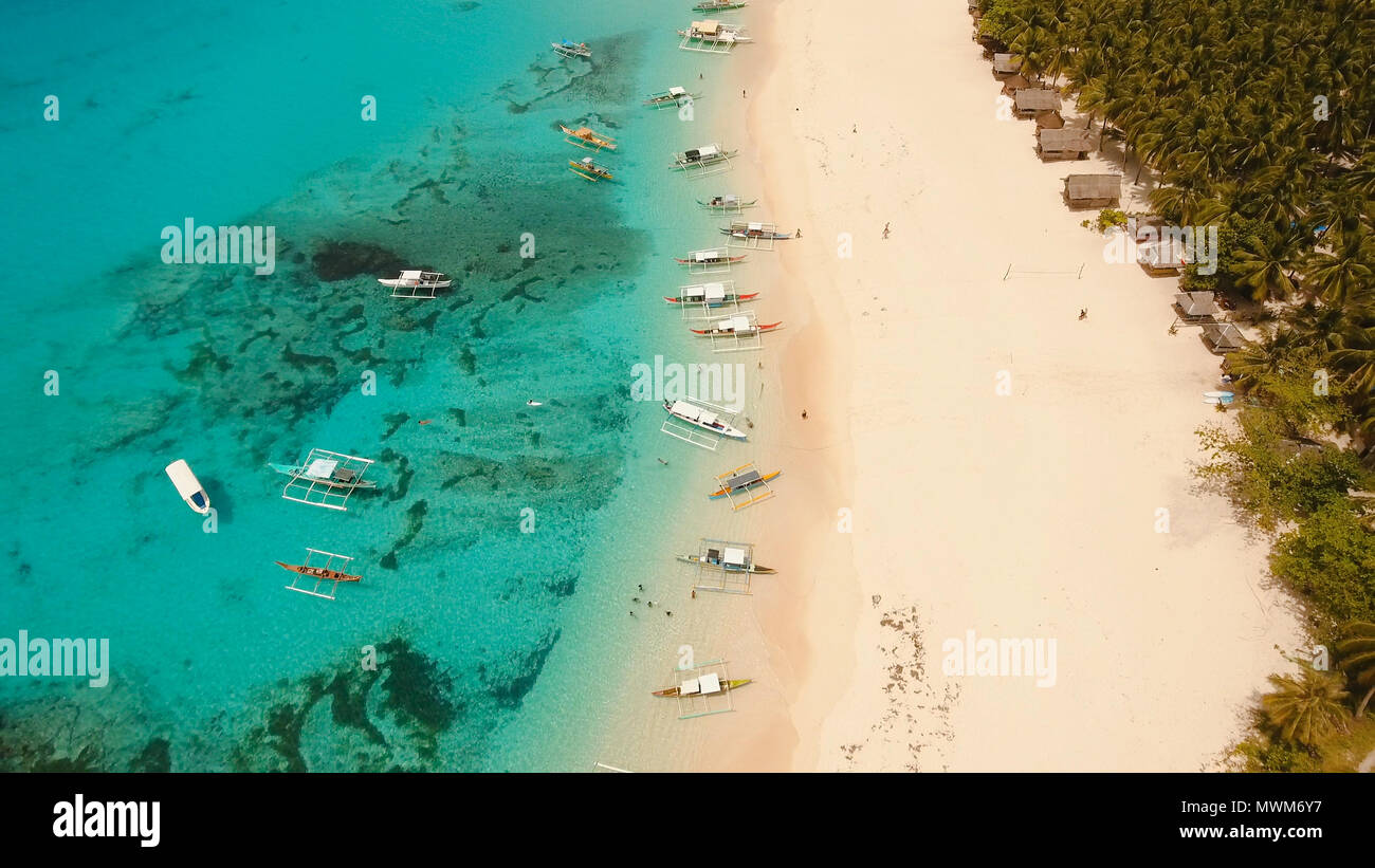 Aerial view of beautiful tropical island Daco with white sand beach ...
