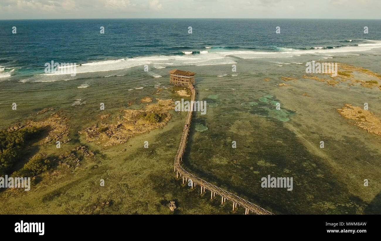 Viewpoint in the ocean at Cloud Nine surf point, Siargao island ...