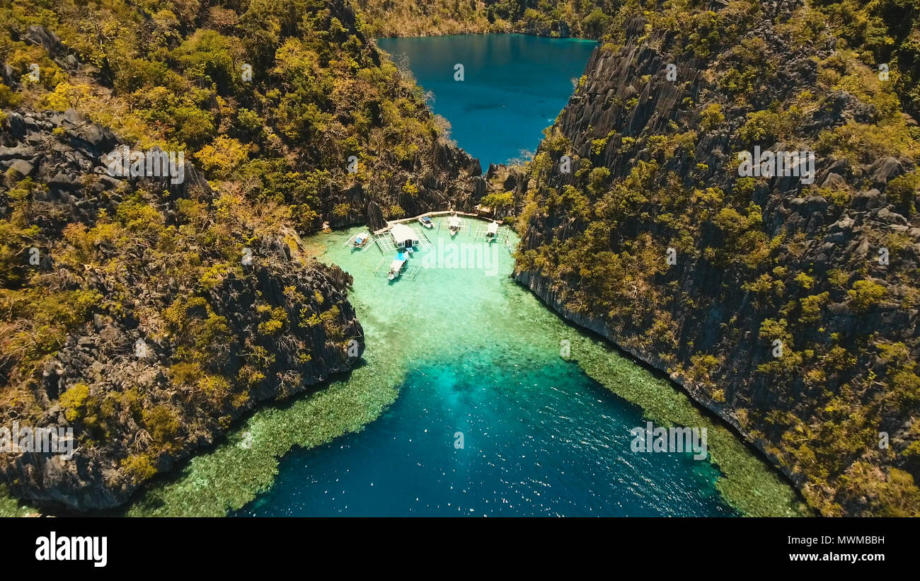 Aerial view: Lagoon with blue, azure water in the middle of small ...