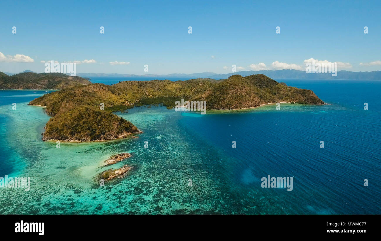 Aerial view: Lagoon with blue, azure water in the middle of small ...
