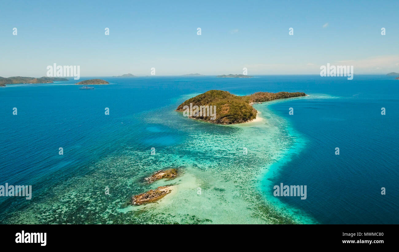 Aerial view: Lagoon with blue, azure water in the middle of small ...