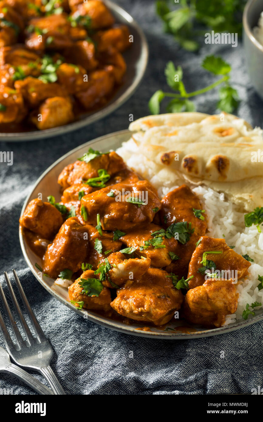 Homemade Chicken Tikka Masala with Rice and Naan Stock Photo - Alamy