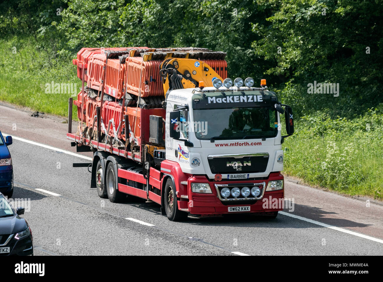 man barrier barriers logistics HGV lorry M6 motorway Stock Photo - Alamy