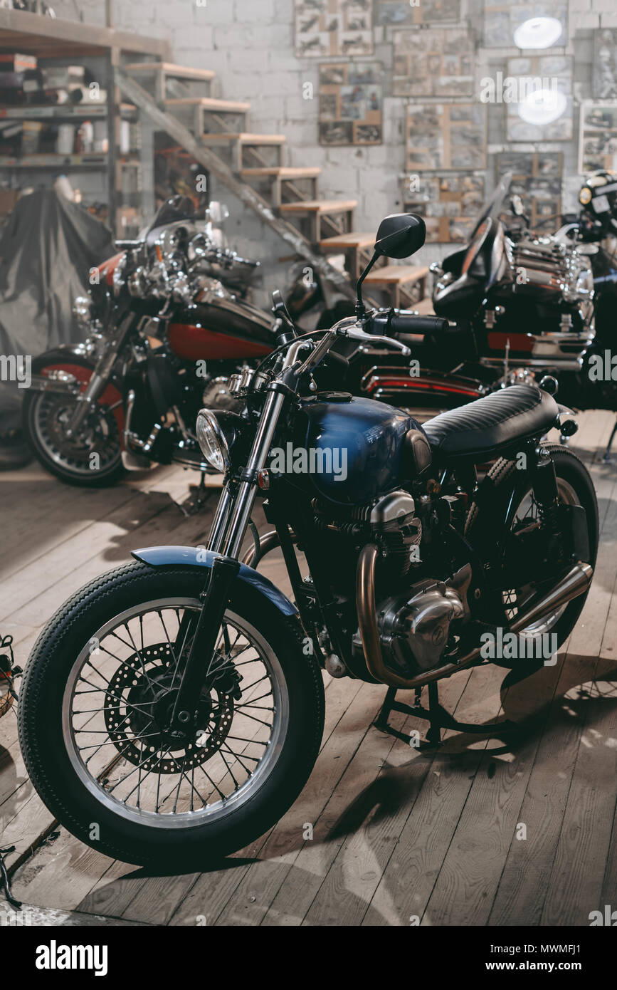 classic motorcycles standing in repair shop Stock Photo - Alamy