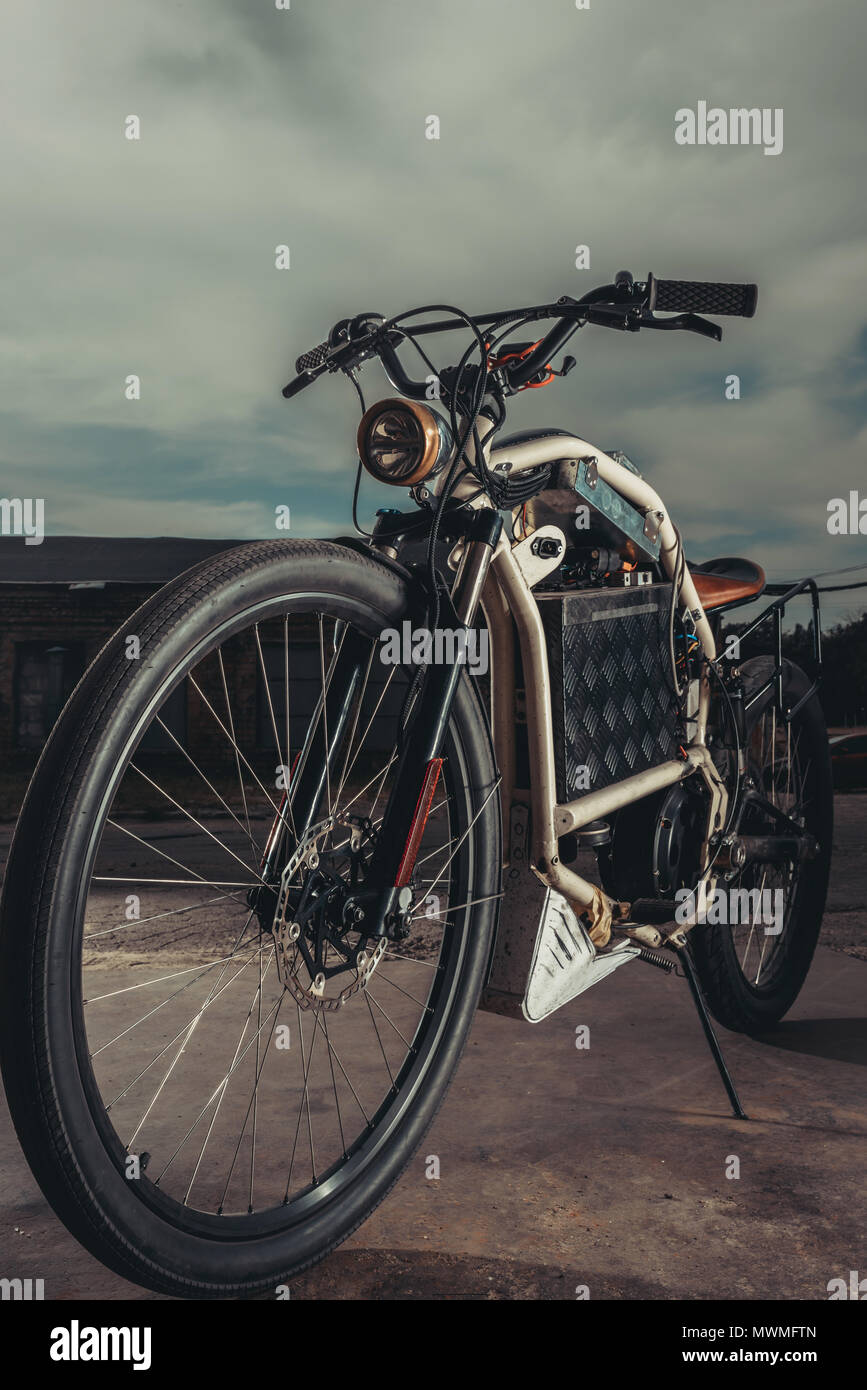 vintage motorcycle standing outside at garage Stock Photo - Alamy