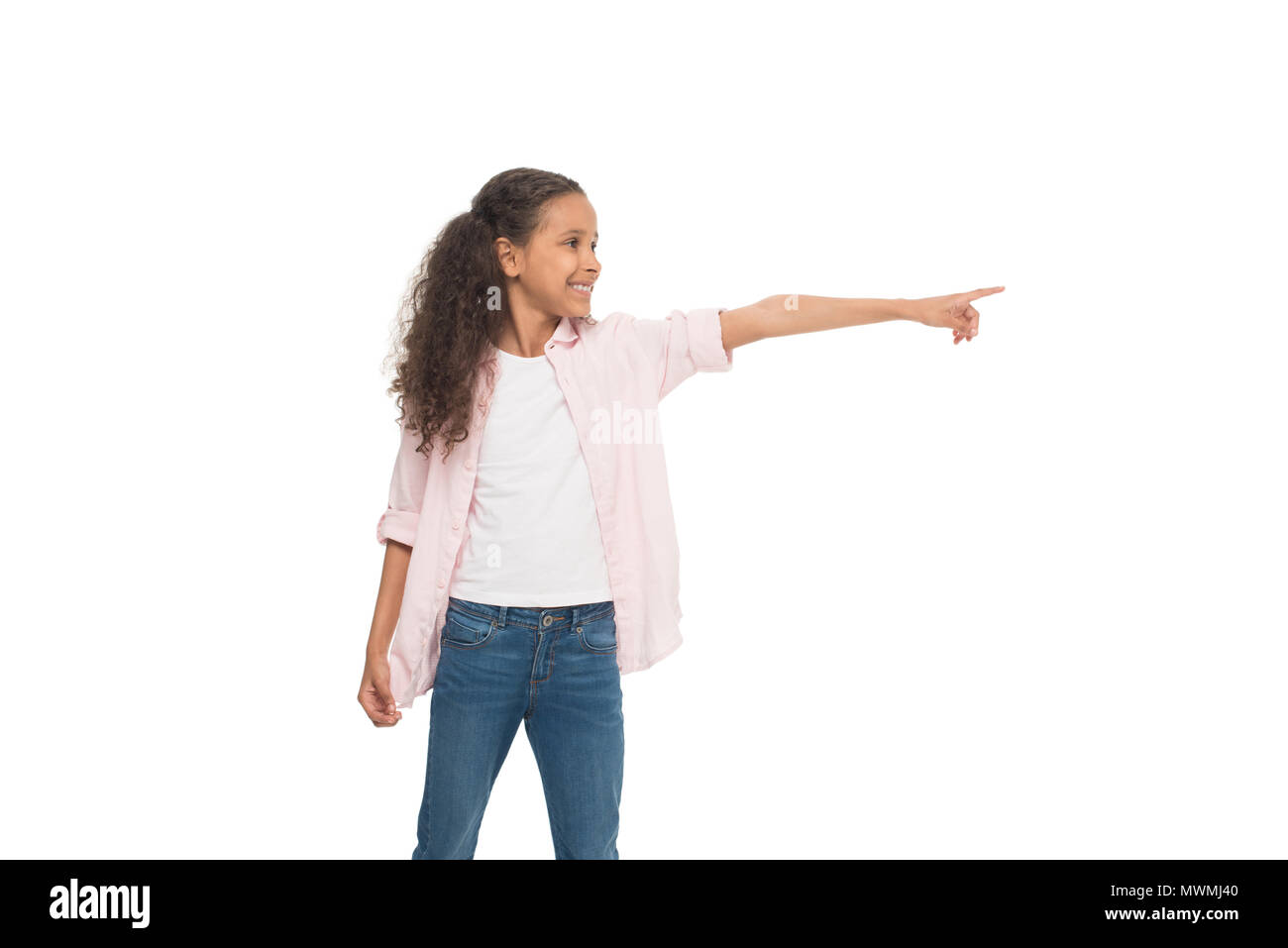 Adorable smiling little girl pointing away isolated on white Stock ...