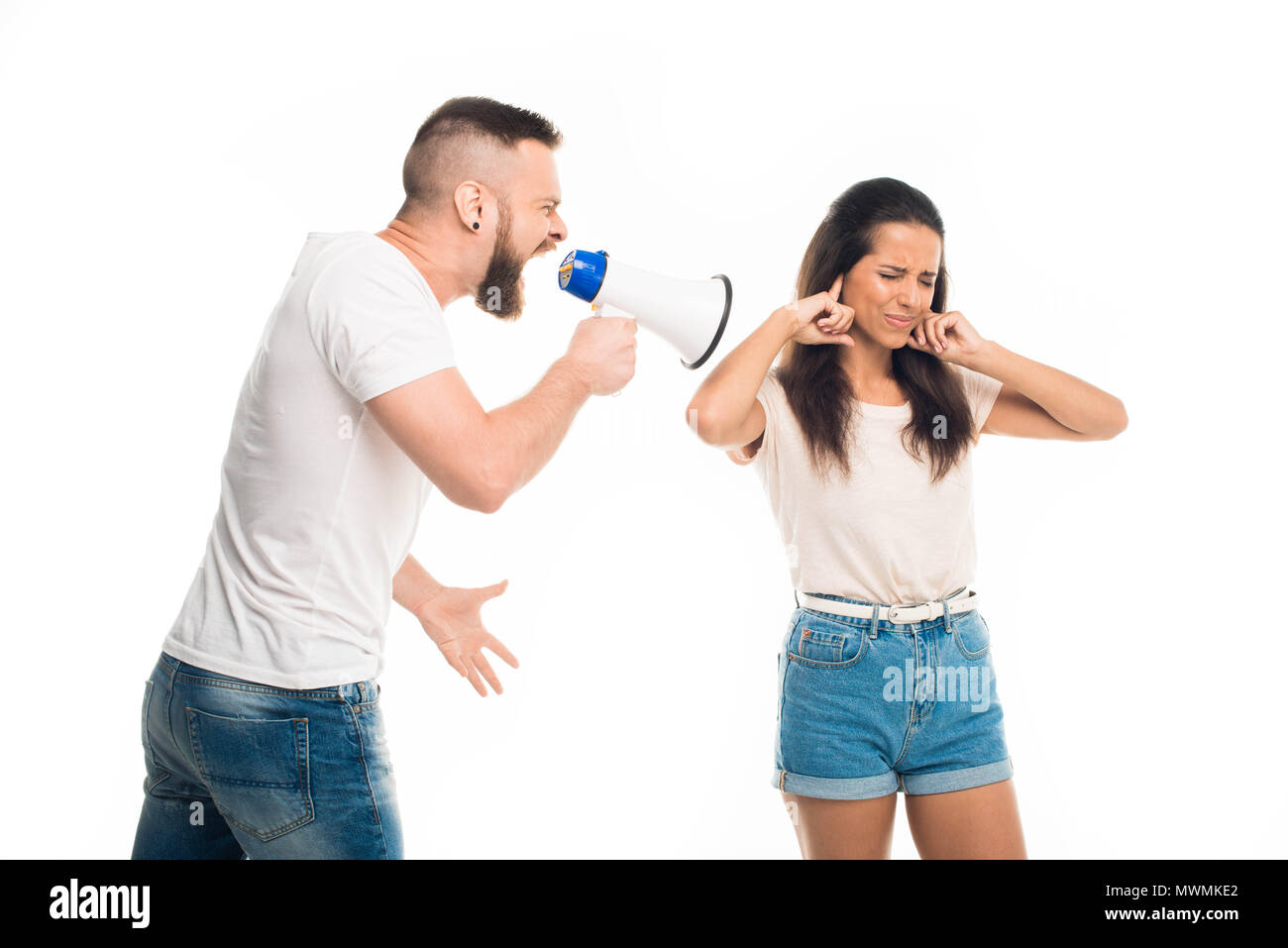 'man screaming on woman with help of megaphone, isolated on white Stock ...