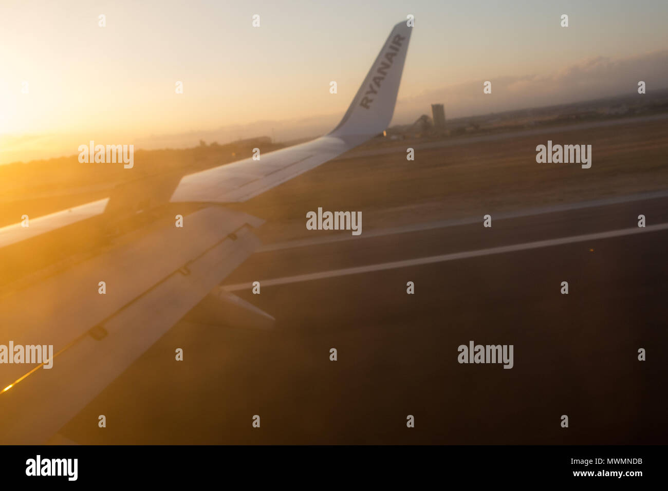 Airbus wing Ryanair, view true window, Europe Stock Photo - Alamy