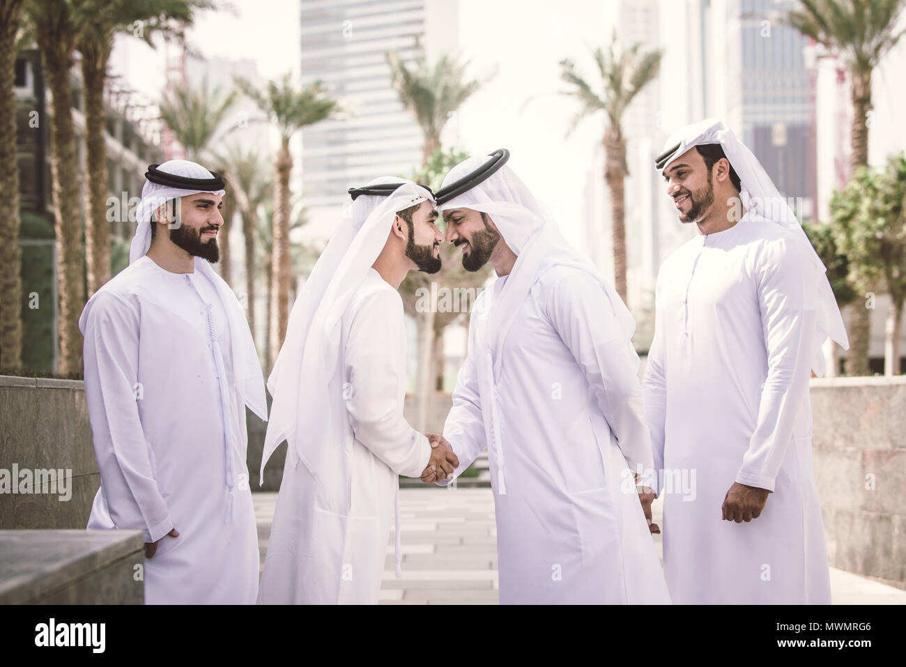 Emirati men greeting hi-res stock photography and images - Alamy