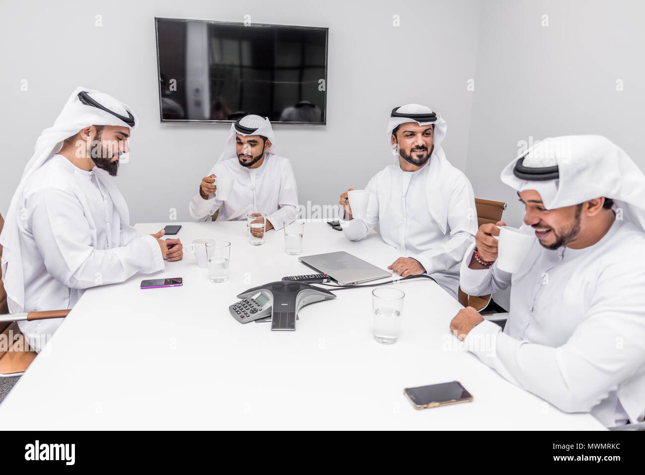 Arabian men meeting and talking about business - Businessmen portrait ...