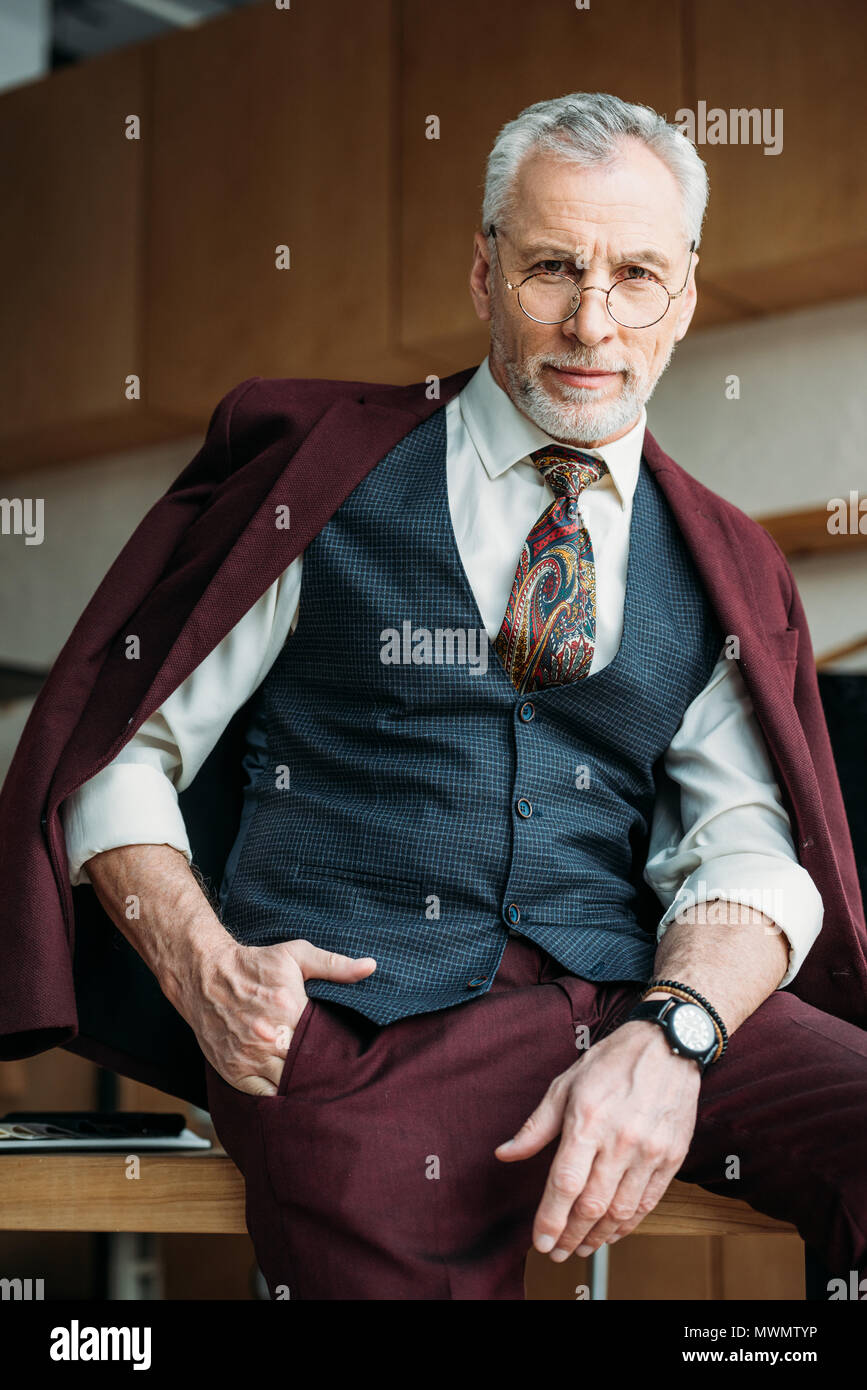 Jacket on shoulders hi-res stock photography and images - Alamy