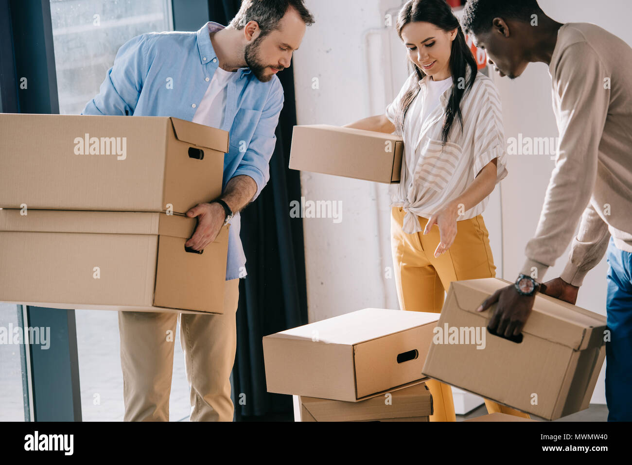 African business people moving boxes hi-res stock photography and ...