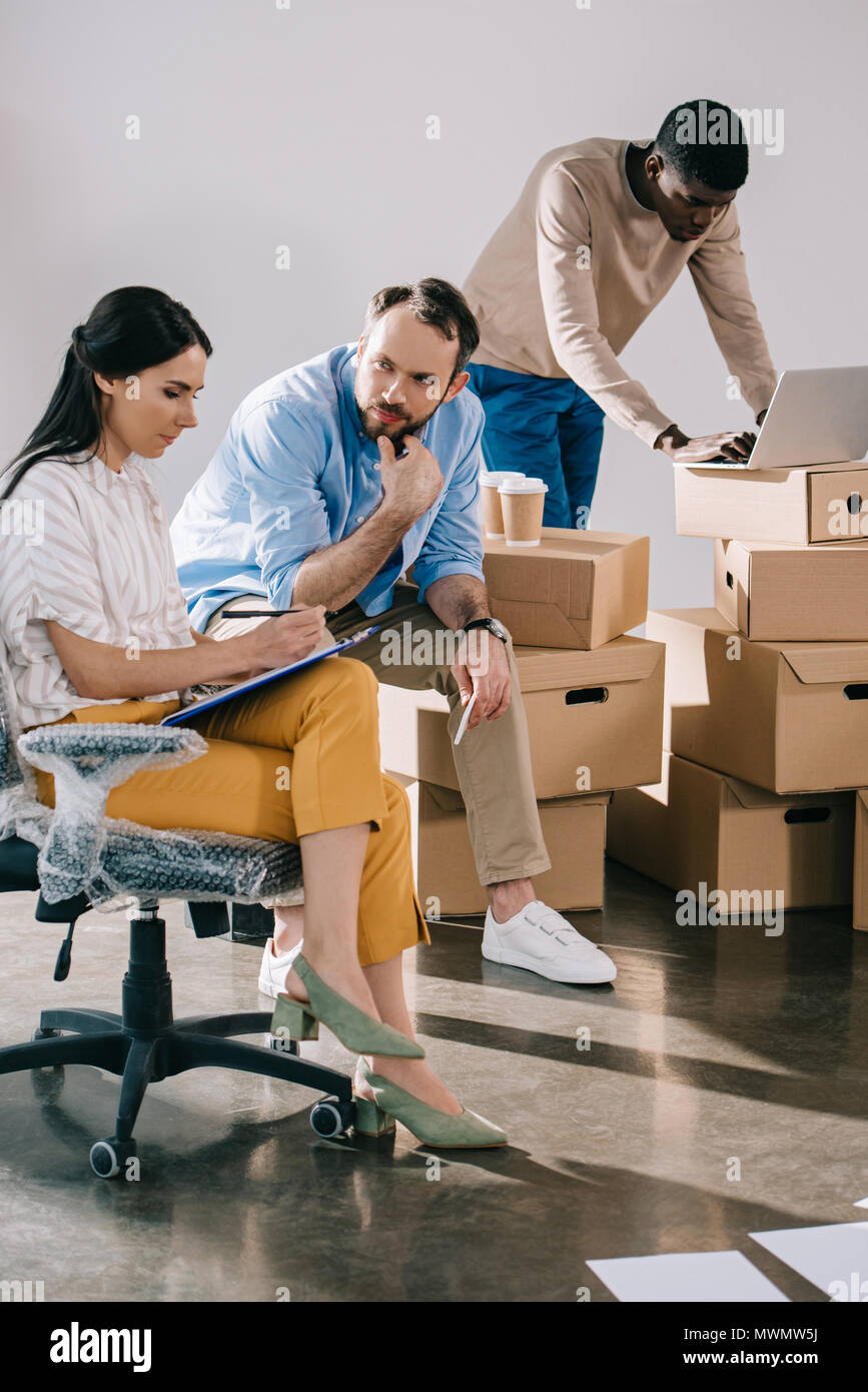 African business people moving boxes hi-res stock photography and ...