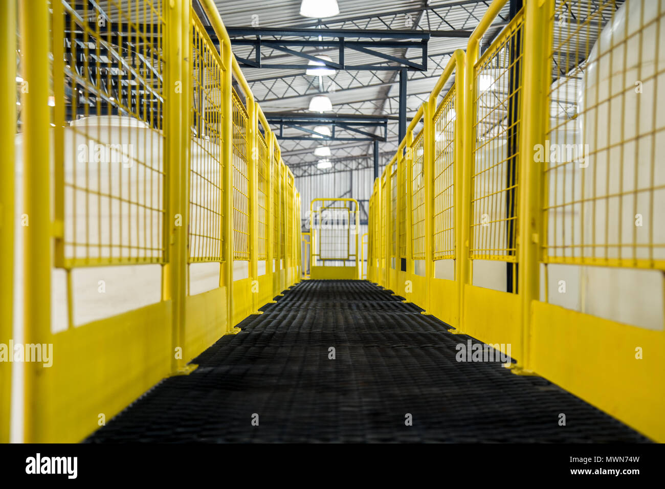 Yellow industrial access platform Stock Photo - Alamy