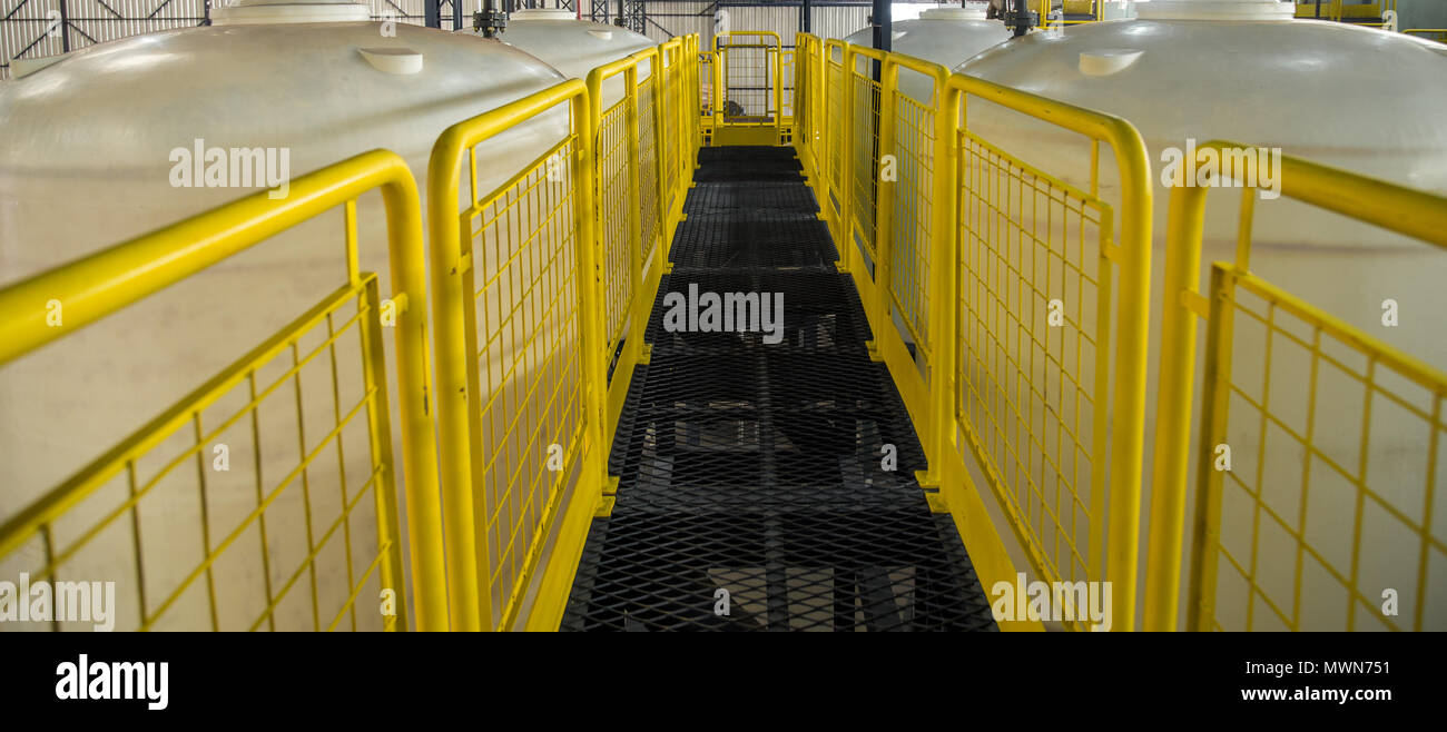 Yellow industrial access platform Stock Photo - Alamy