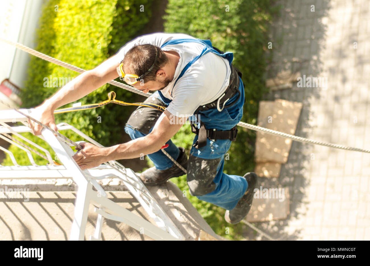 Industrial climber at work Stock Photo - Alamy