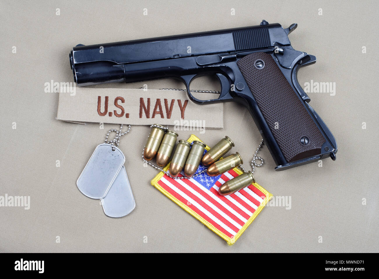 handgun on navy uniform Stock Photo - Alamy