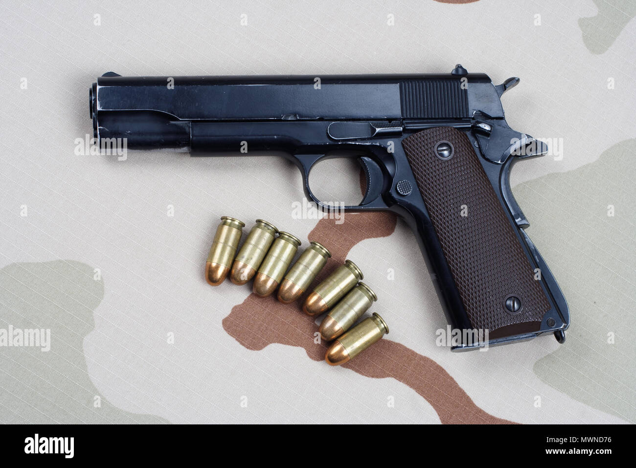 handgun on army uniform Stock Photo - Alamy