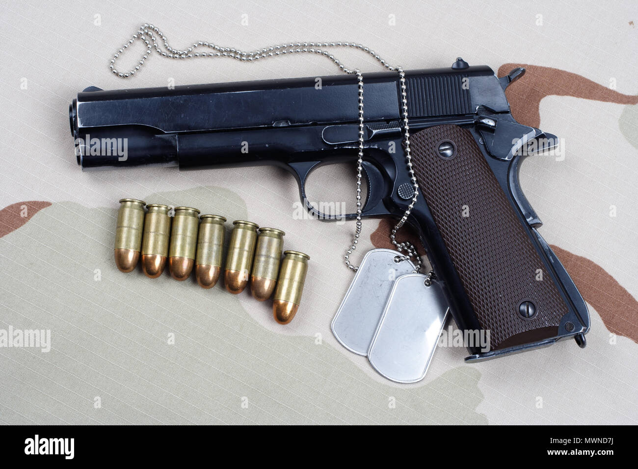handgun on army uniform Stock Photo - Alamy