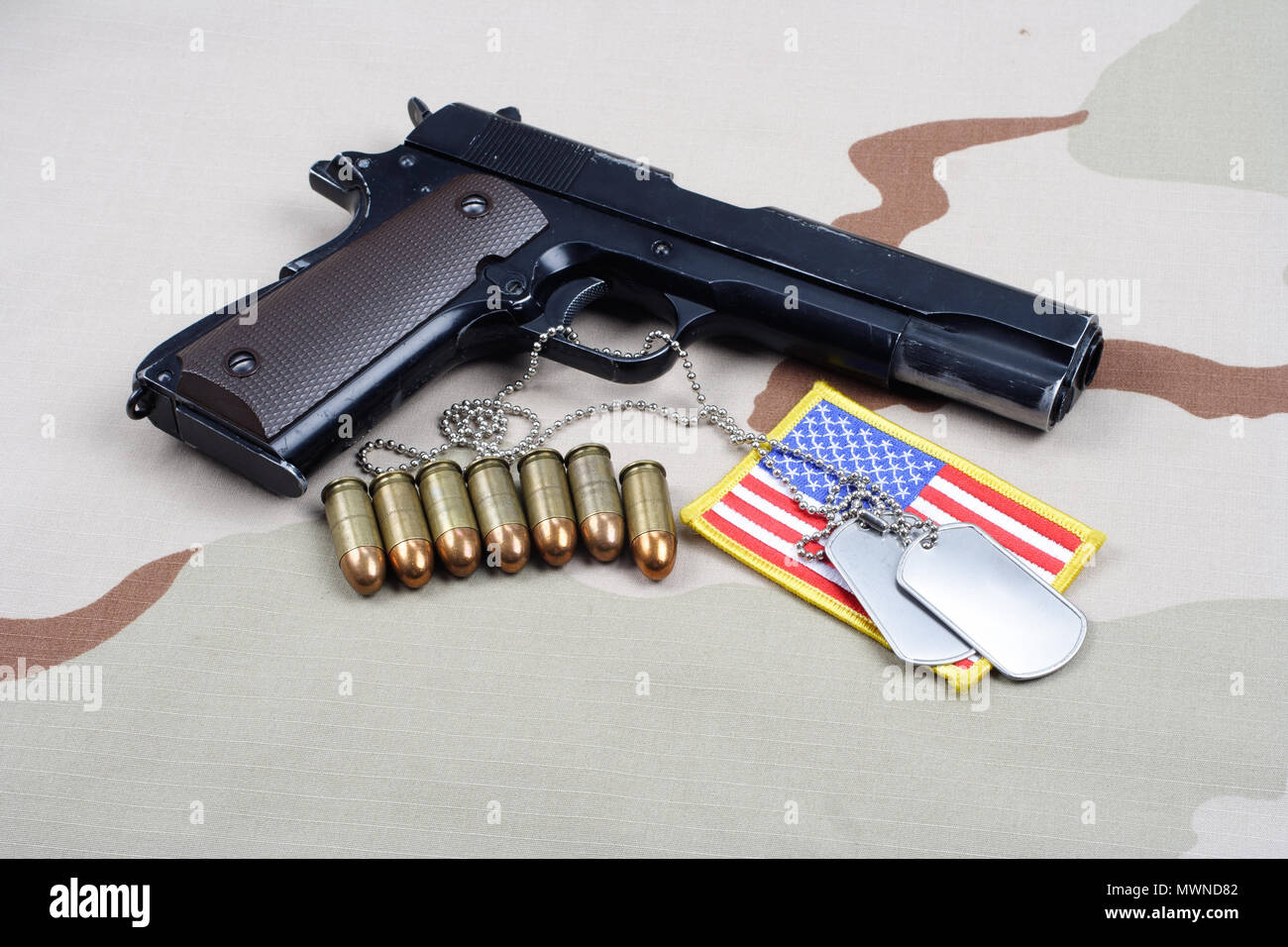 handgun on army uniform Stock Photo - Alamy