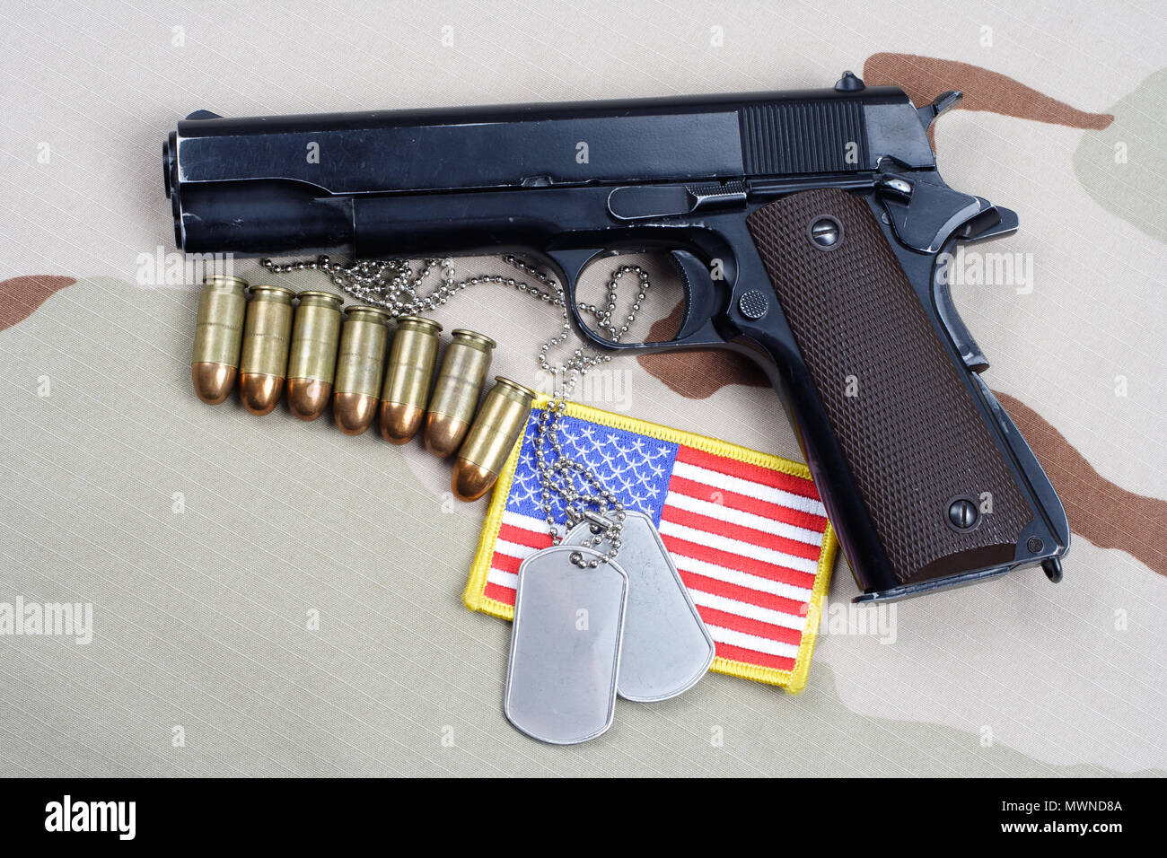 handgun on army uniform Stock Photo - Alamy
