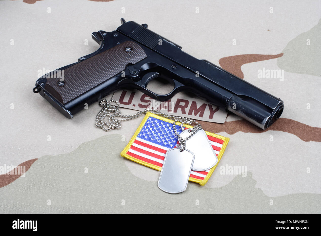 handgun on army uniform Stock Photo - Alamy