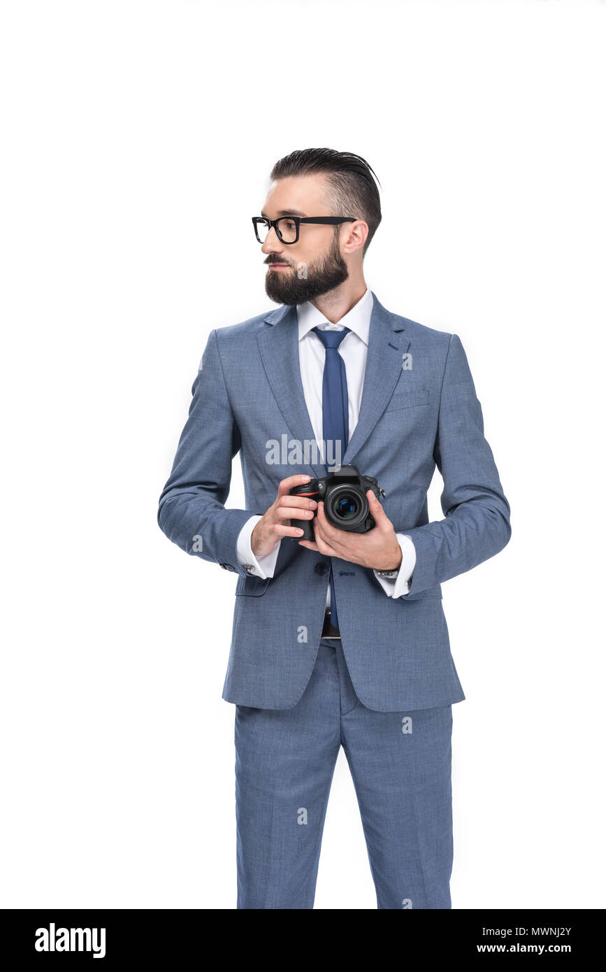 handsome male photographer holding professional camera, isolated on ...