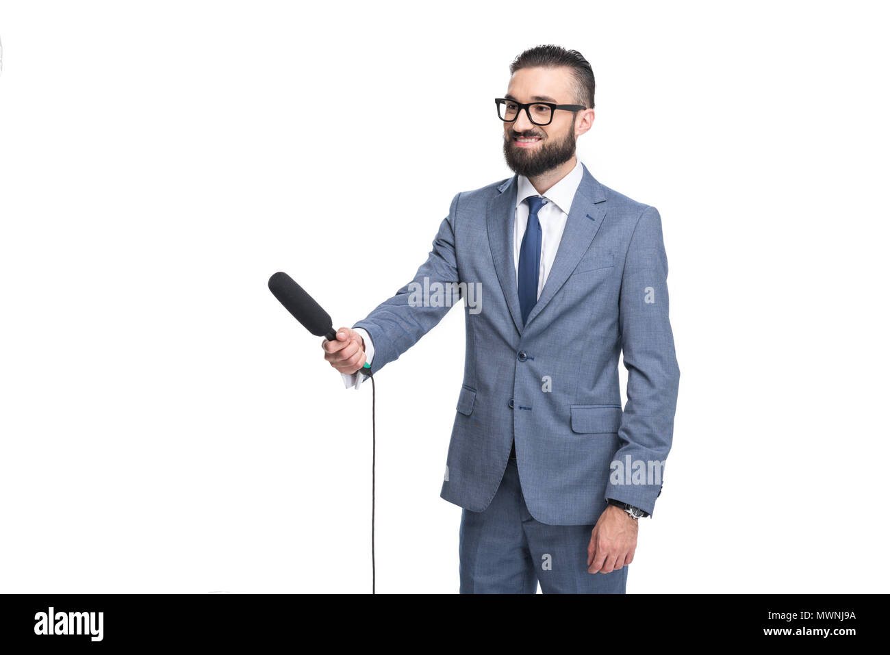 happy handsome male journalist taking interview with microphone ...