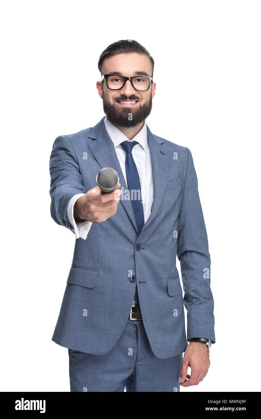 handsome smiling male television reporter taking interview with ...
