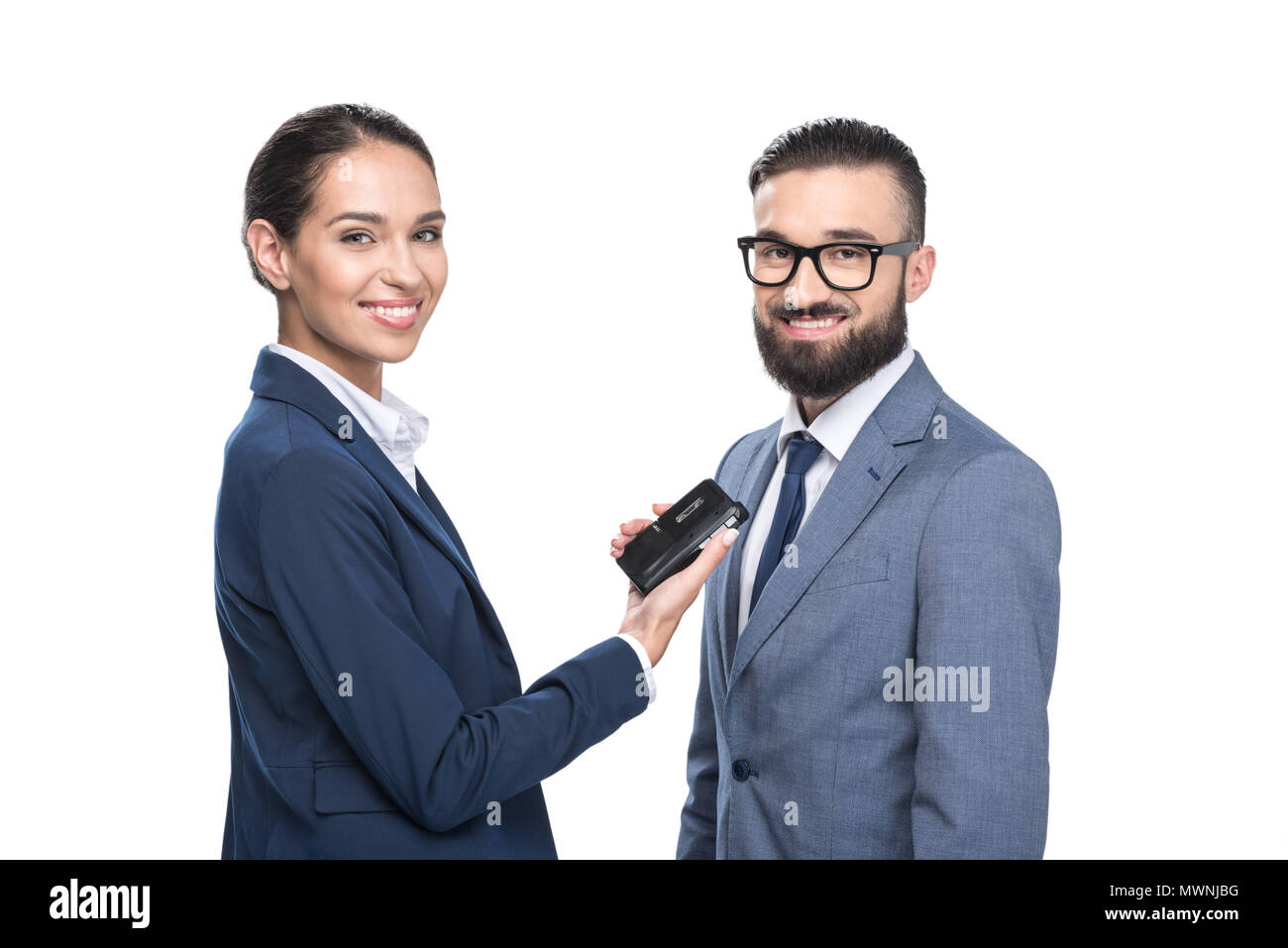 smiling female journalist interviewing a businessman, isolated on white ...
