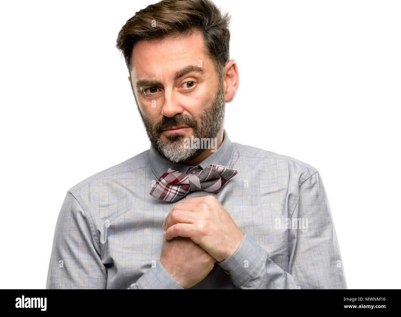 Middle age man, with beard and bow tie crying depressed full of sadness ...