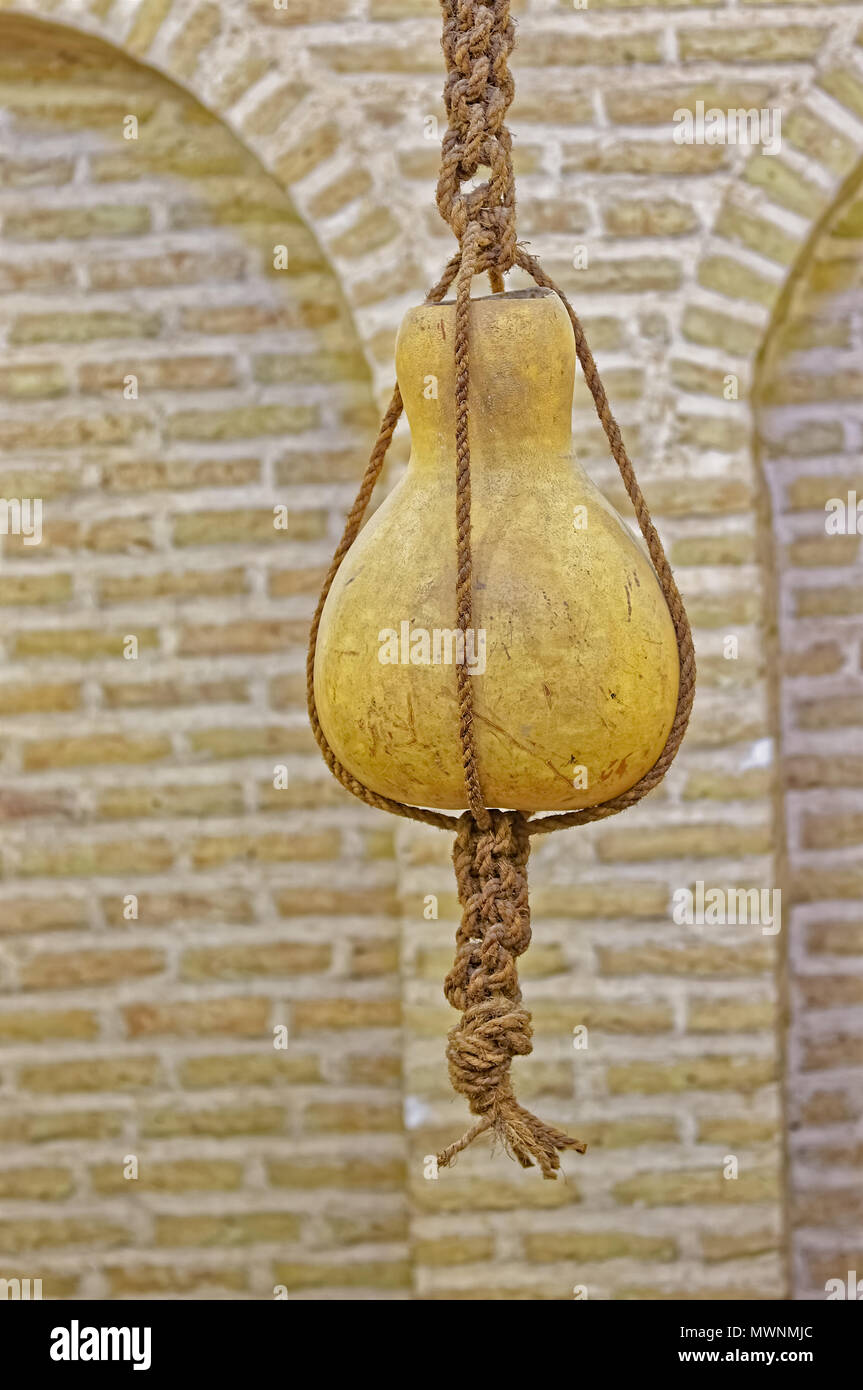 YAZD, IRAN - MAY 5, 2015: Gourd hunged on the rope in the traditional ...