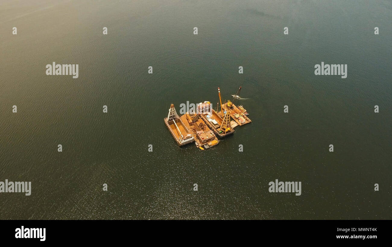 Dredge ship presumably performing harbor and channel maintenance ...