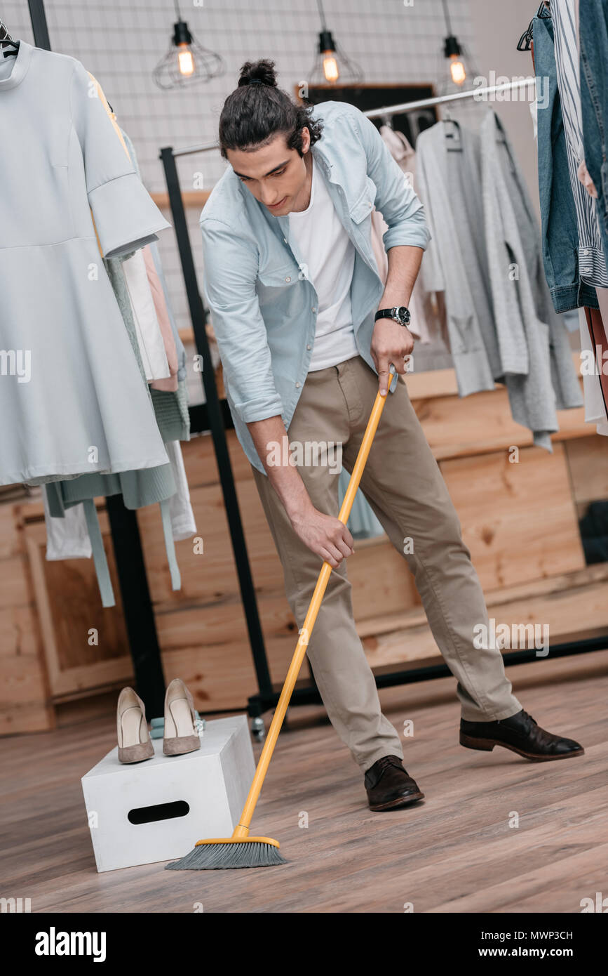 Broom sweeping floor hi-res stock photography and images - Alamy