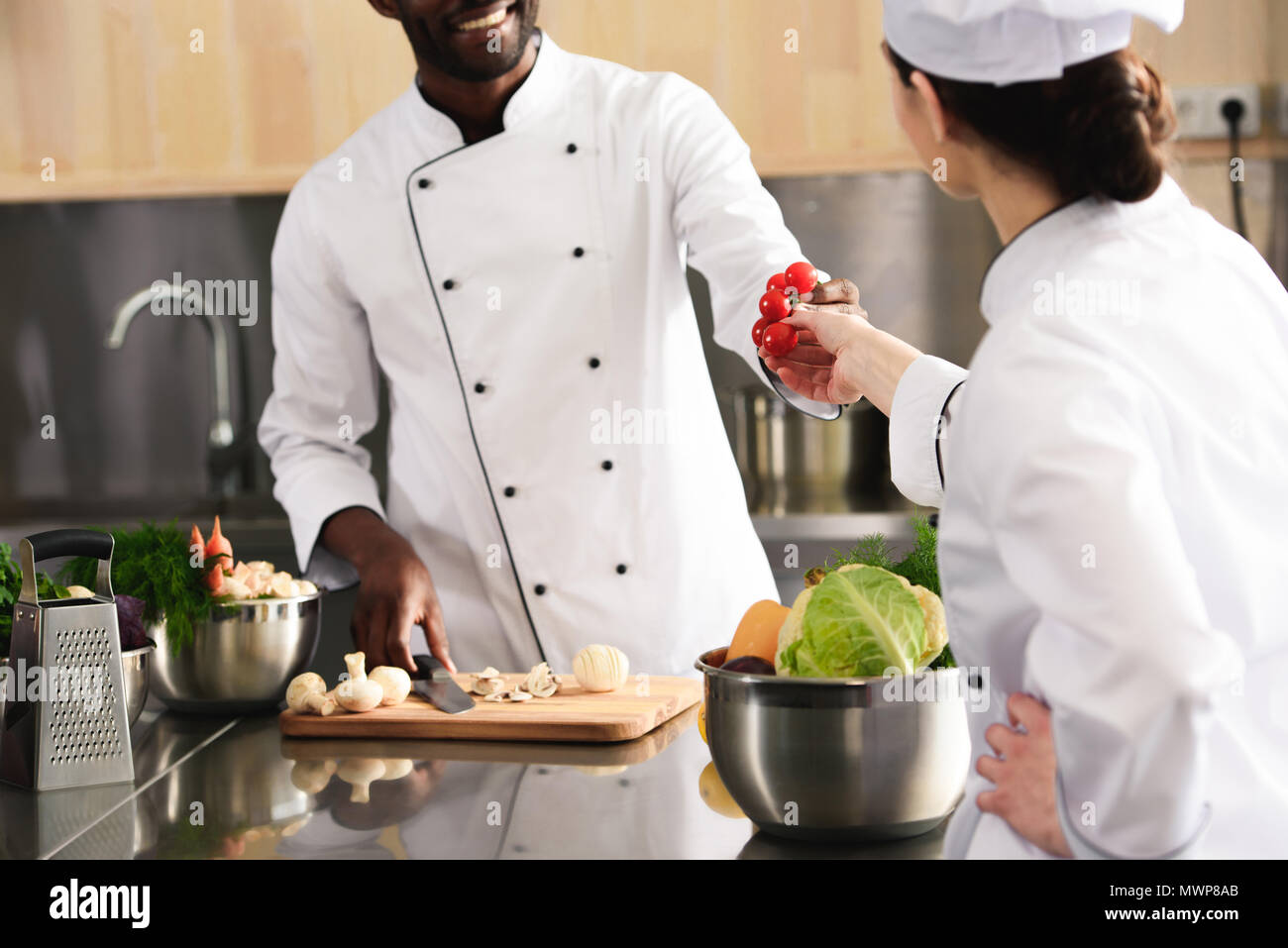 Team of cooks hi-res stock photography and images - Alamy