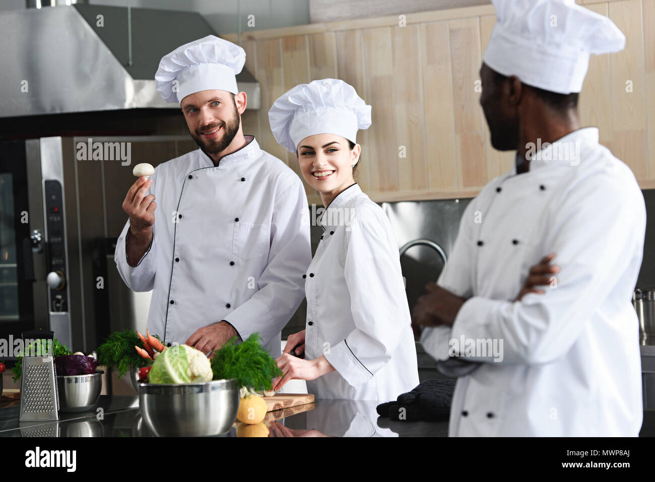 Kitchen brigade working hi-res stock photography and images - Alamy