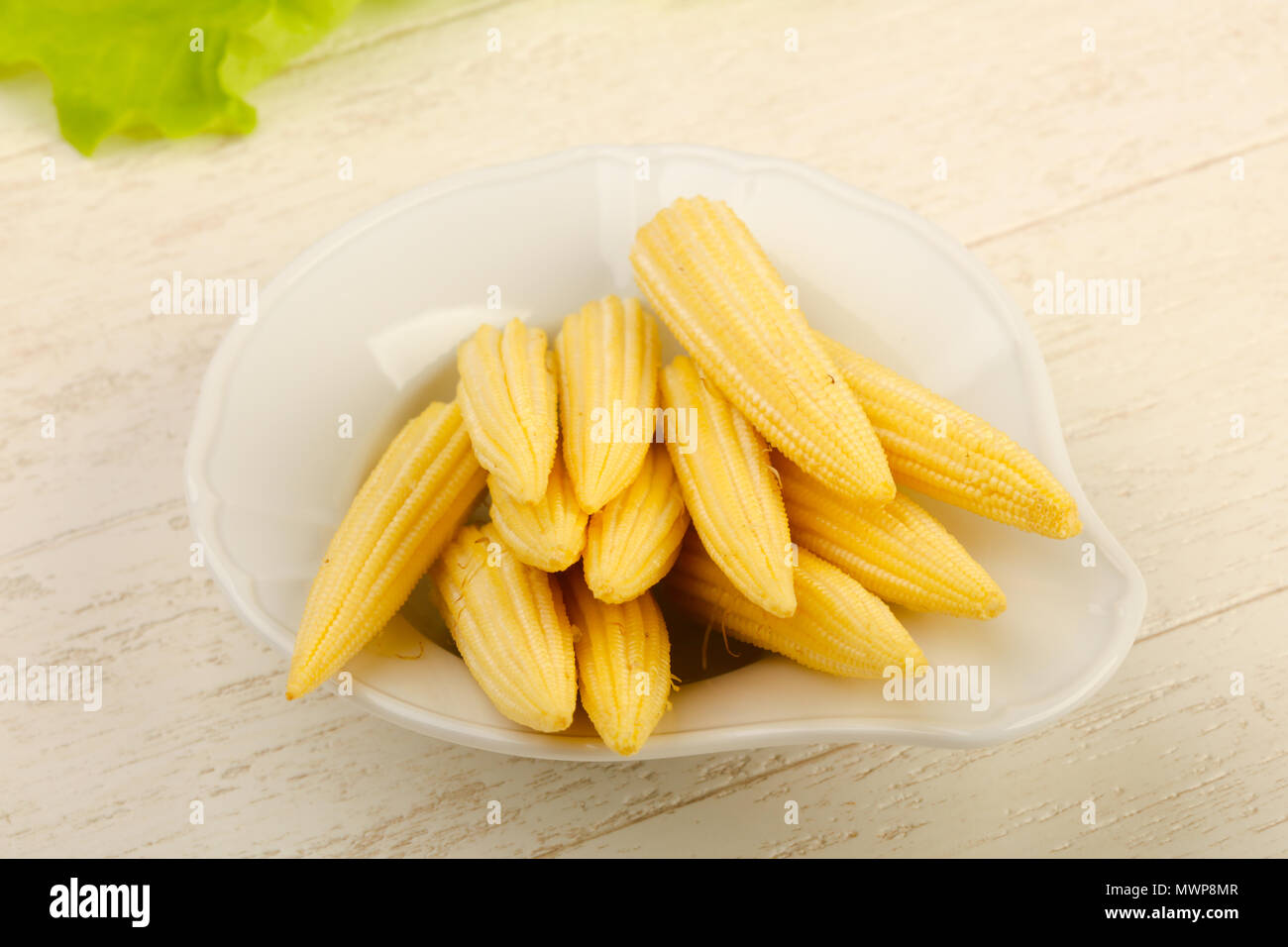 Young raw baby corn Stock Photo - Alamy
