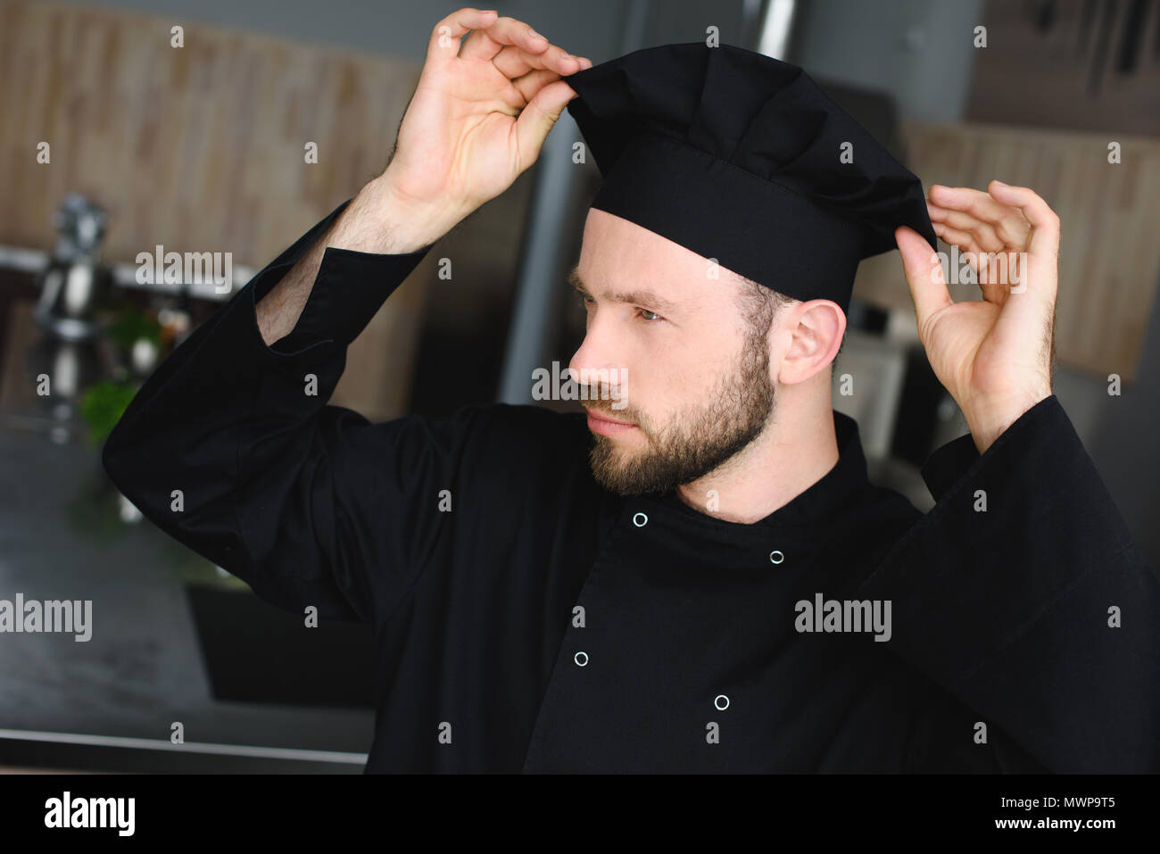 handsome chef wearing hat at restaurant kitchen Stock Photo - Alamy