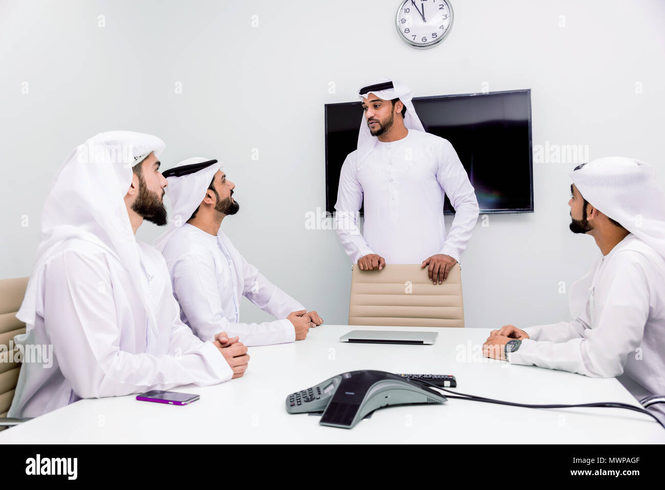 Arabian men meeting and talking about business - Businessmen portrait ...
