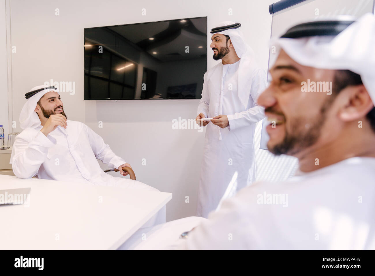 Arabian men meeting and talking about business - Businessmen portrait ...