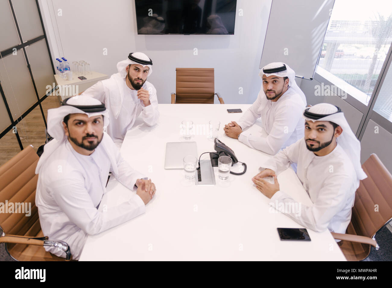 Arabian men meeting and talking about business - Businessmen portrait ...