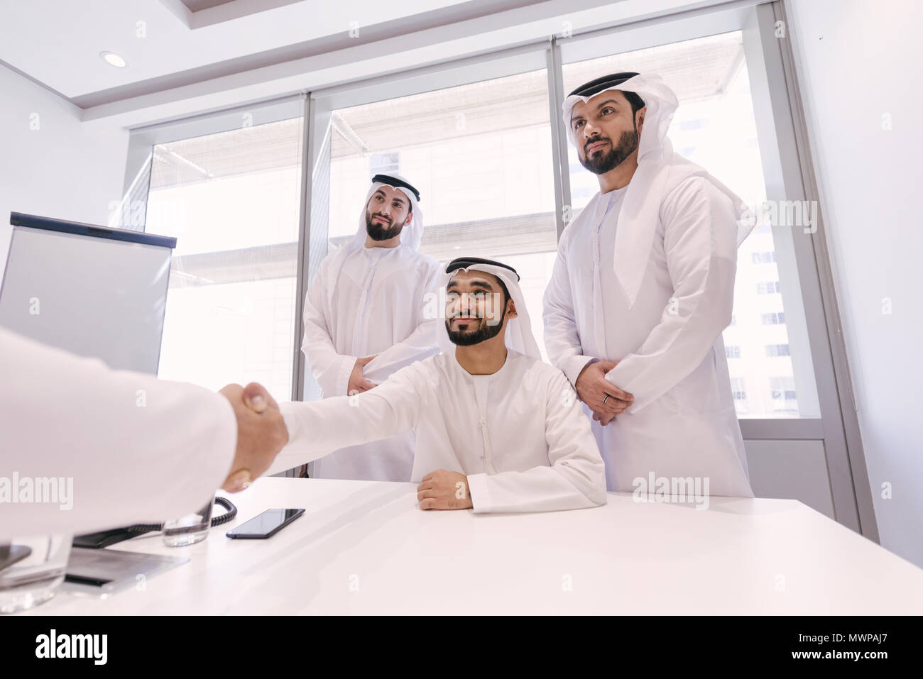 Arabian men meeting and talking about business - Businessmen portrait ...