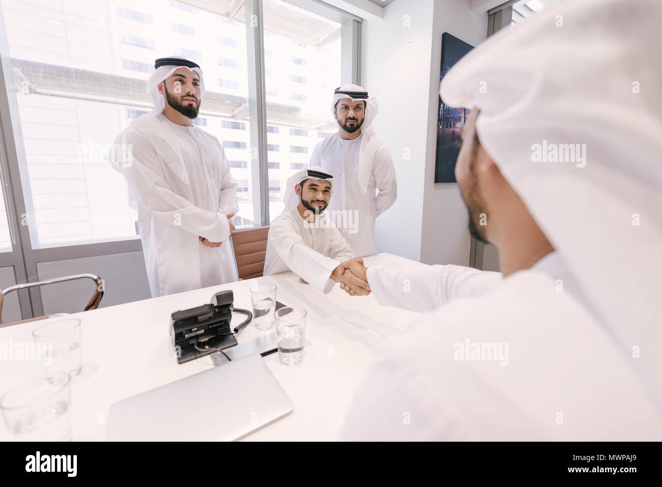 Arabian men meeting and talking about business - Businessmen portrait ...
