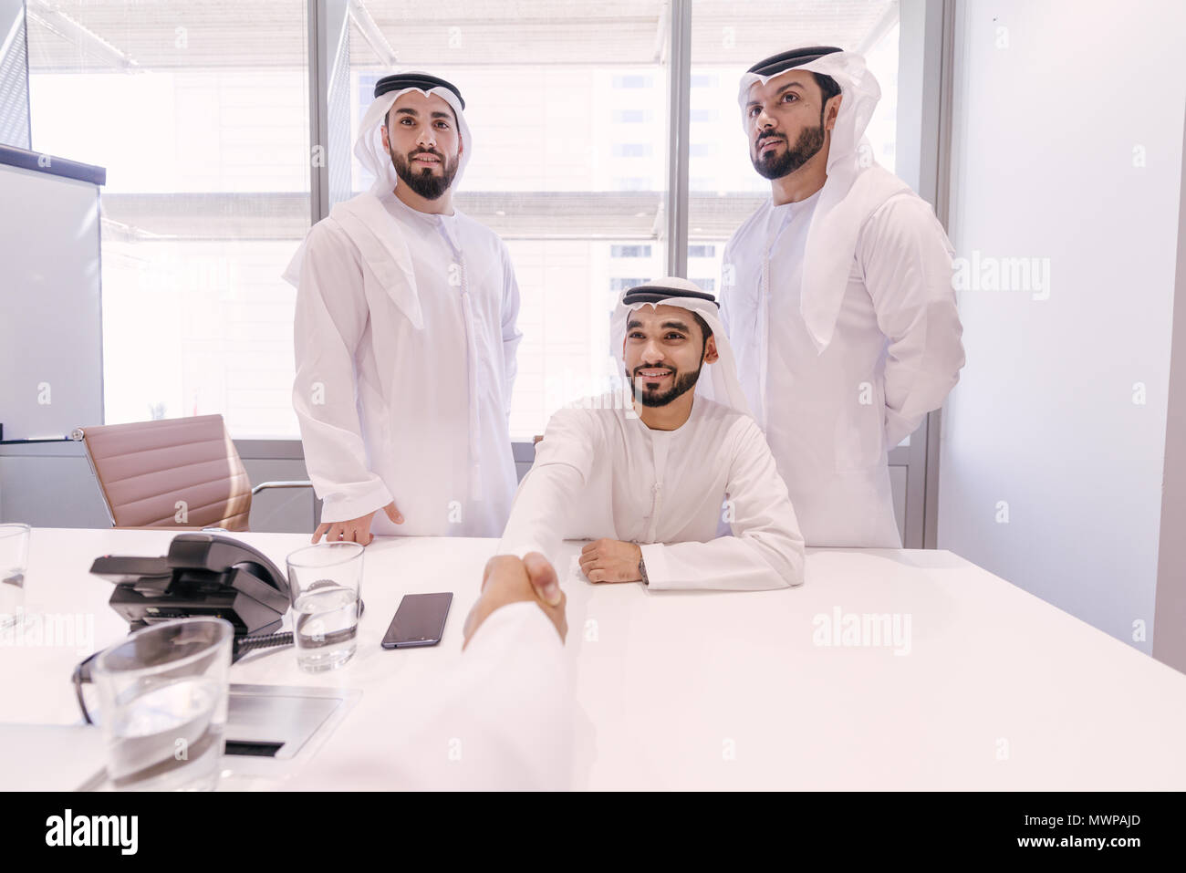 Arabian men meeting and talking about business - Businessmen portrait ...