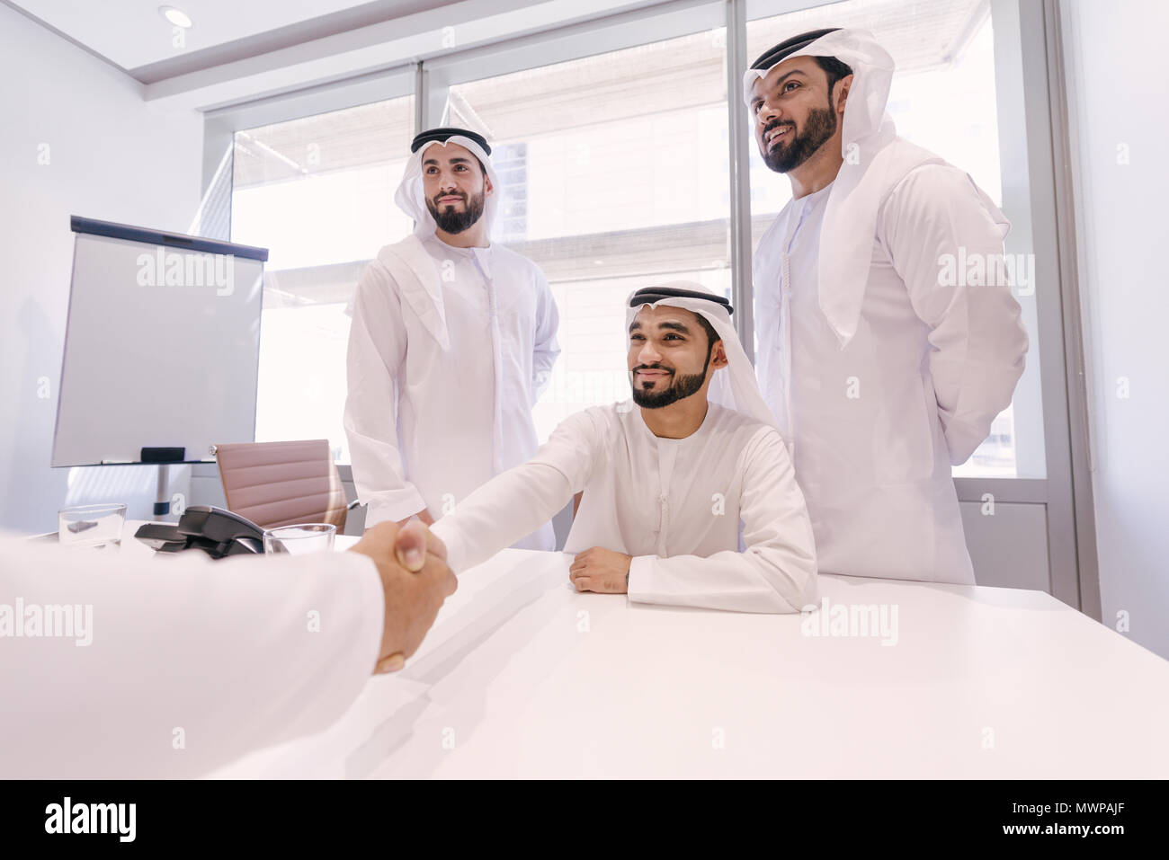 Arabian men meeting and talking about business - Businessmen portrait ...